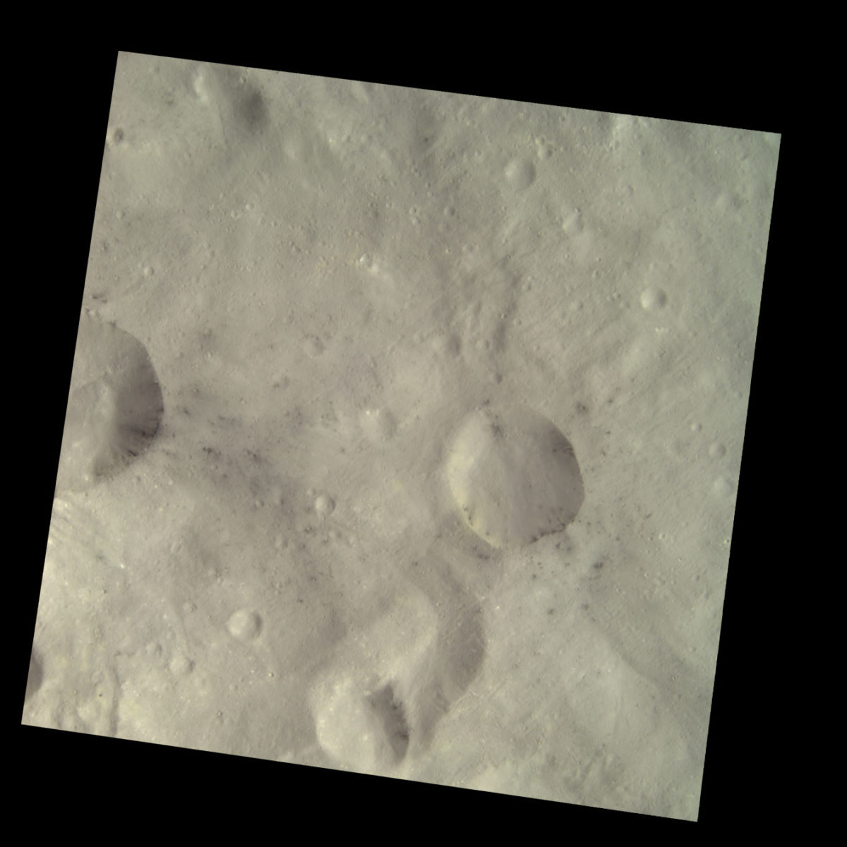 Dark spots on Vesta (HAMO color image) | The Planetary Society