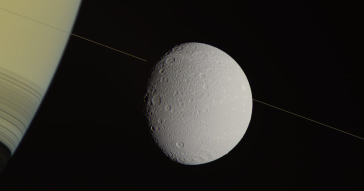Dione and Saturn and an almost invisible ring | The Planetary Society