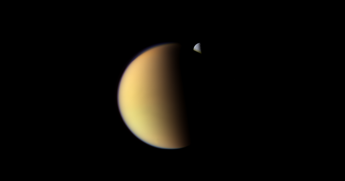 Rhea behind Titan | The Planetary Society