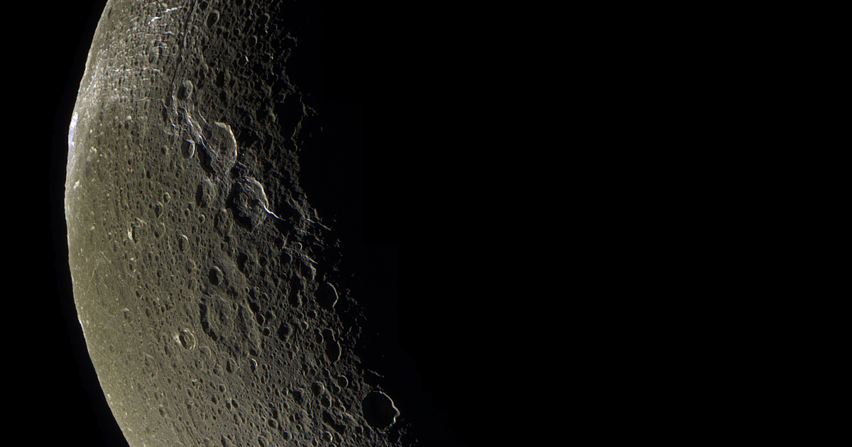 Crescent Dione in false color | The Planetary Society