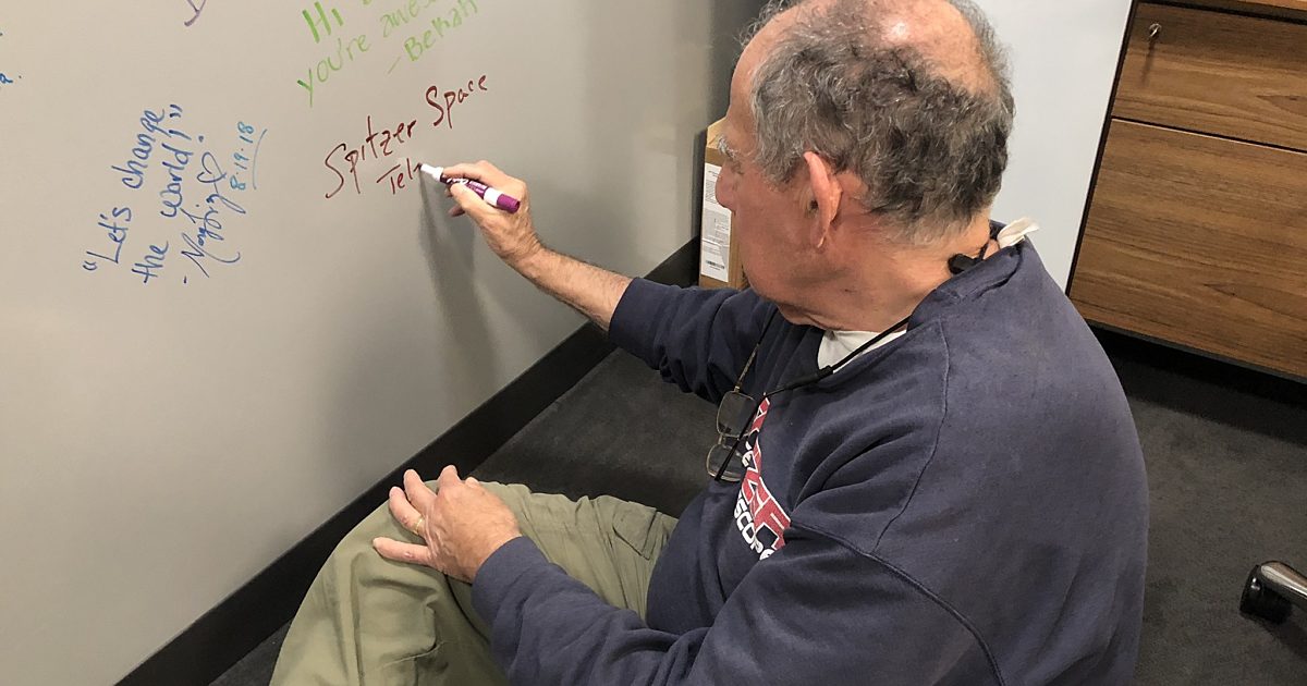 Mike Werner signing the Planetary Wall of Fame | The Planetary Society