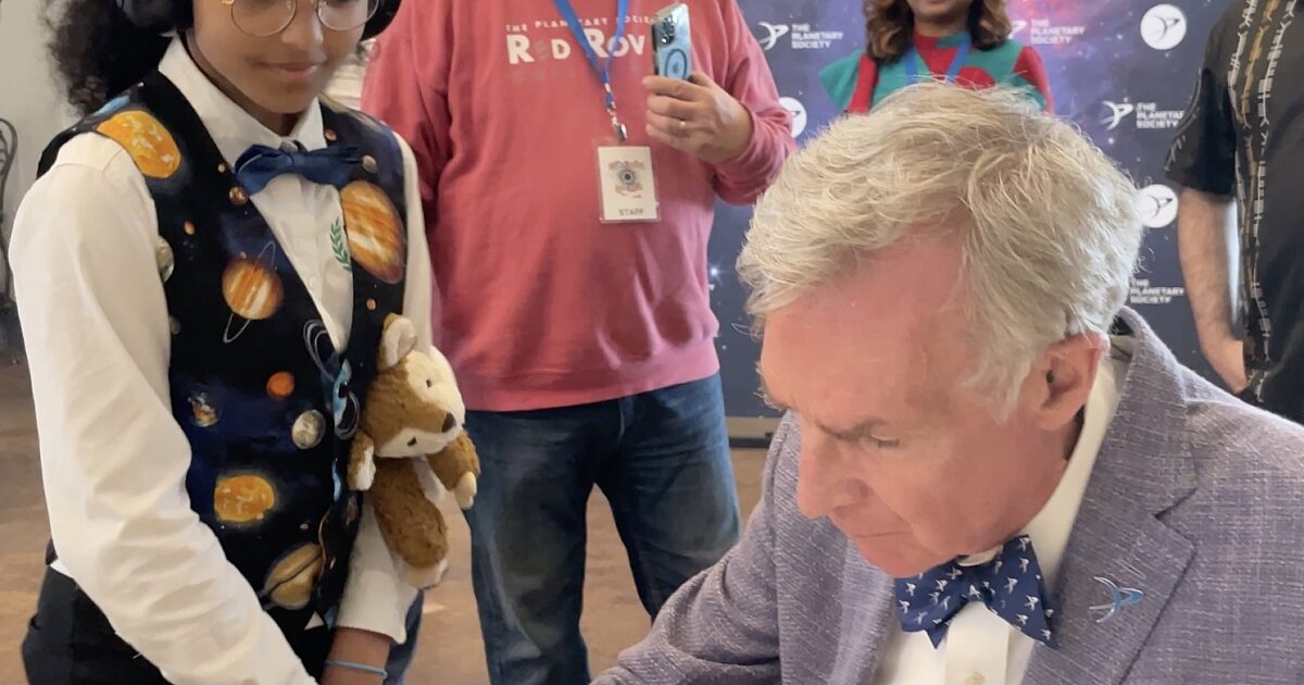 Bill Nye signing at Eclipse-O-Rama 2024 | The Planetary Society
