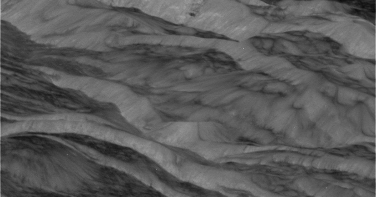 Dione's scarps and slopes | The Planetary Society