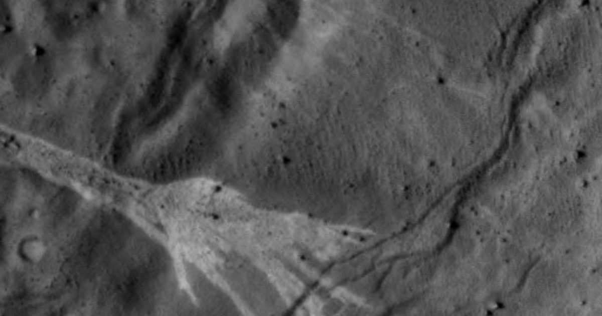 Newly formed gully in wall of Martian crater… | The Planetary Society
