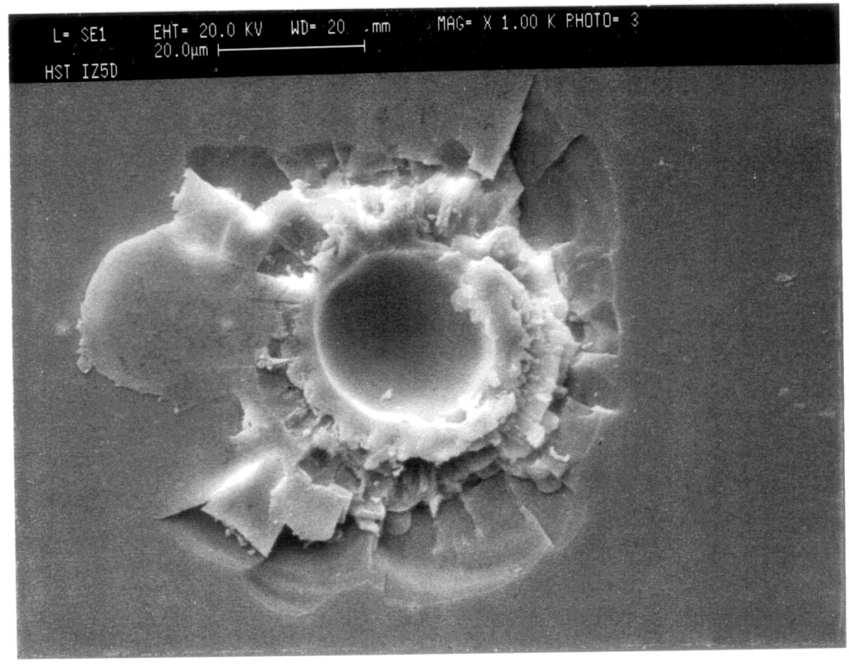 Hubble solar array impact crater | The Planetary Society