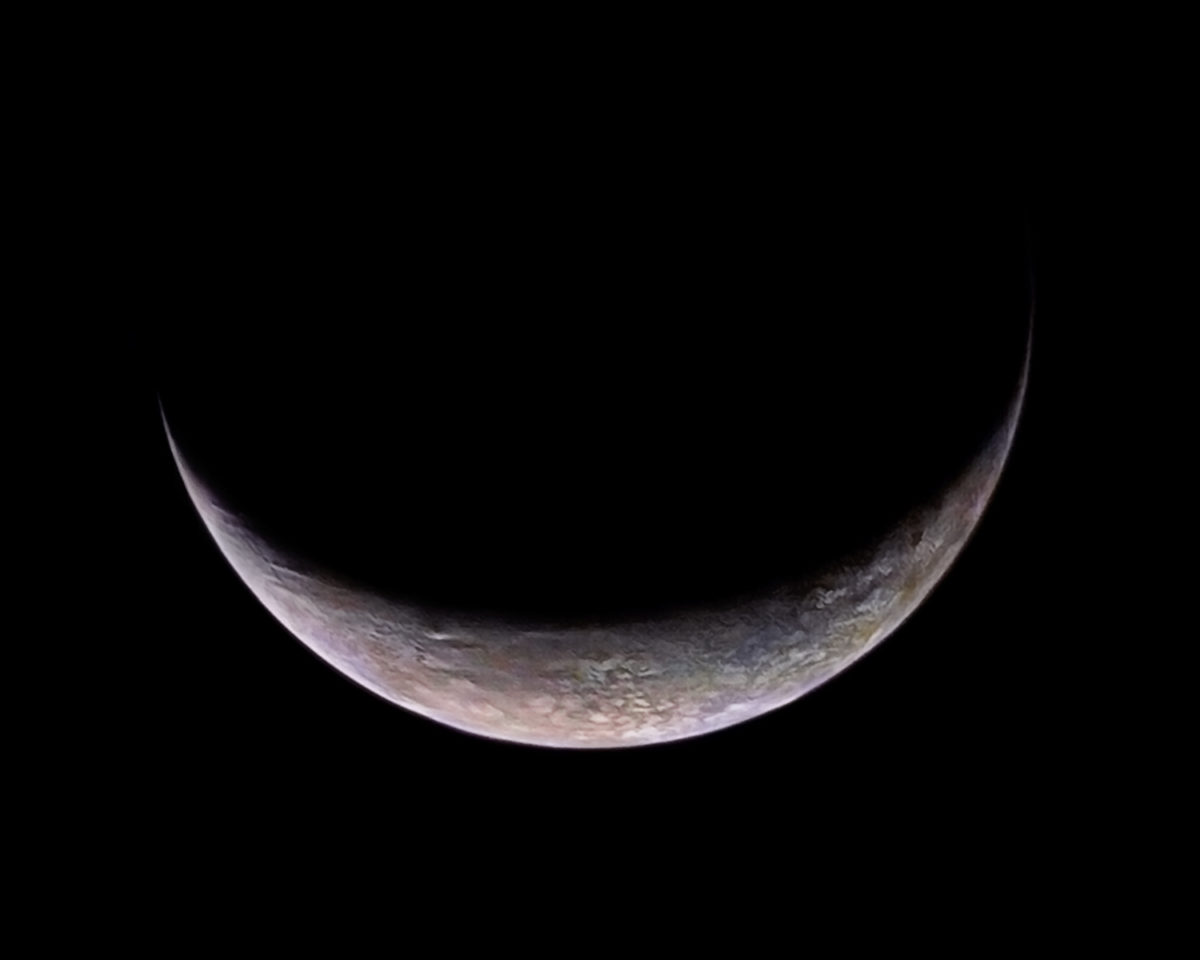 Triton’s crescent in color | The Planetary Society