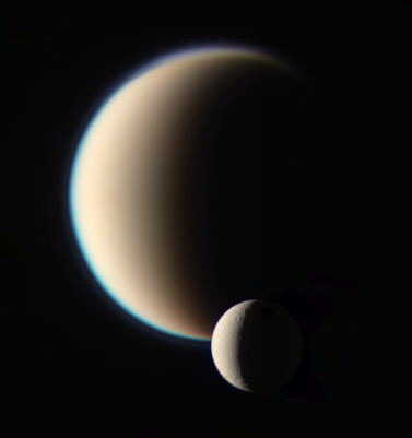 Dione passing in front of Titan | The Planetary Society
