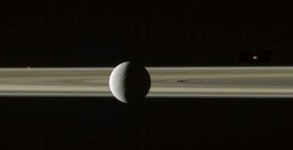 Rhea on the rings with Prometheus and Janus | The Planetary Society