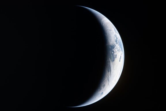Crescent Earth from Artemis II | The Planetary Society