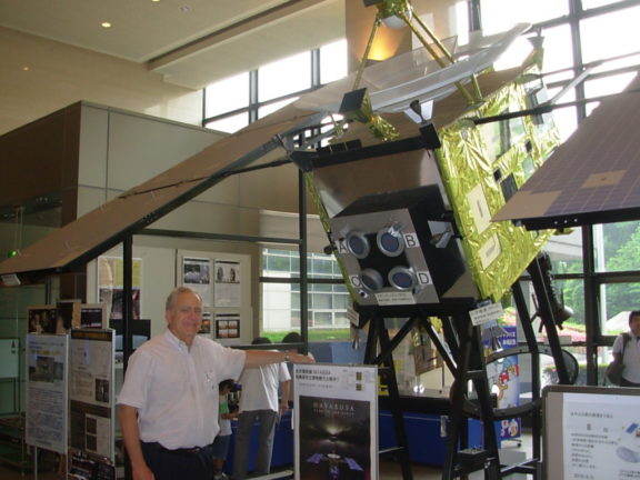 Lou Friedman with a model of Hayabusa | The Planetary Society