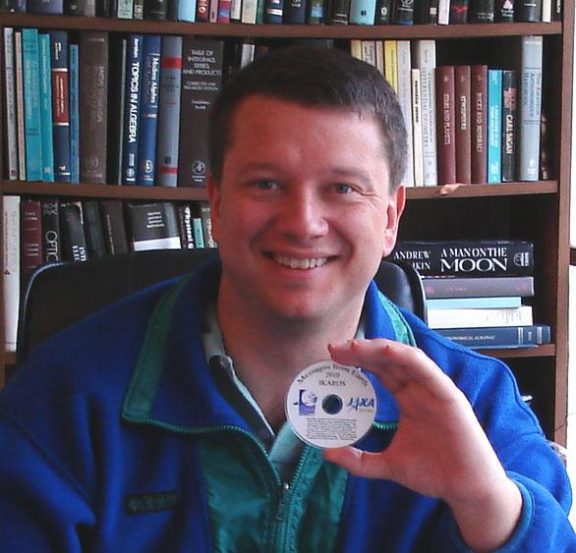 Bruce Betts with the IKAROS names disk | The Planetary Society