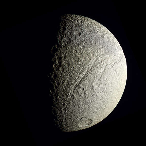 Tethys in enhanced color: south pole and… | The Planetary Society