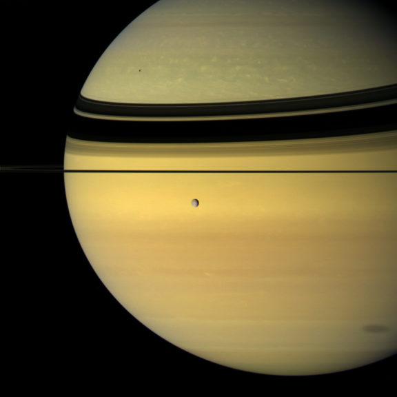 Saturn with Tethys and Mimas' shadow | The Planetary Society