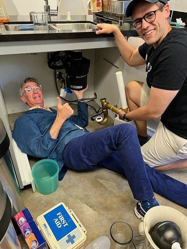 Bill fixing the garbage disposal | The Planetary Society