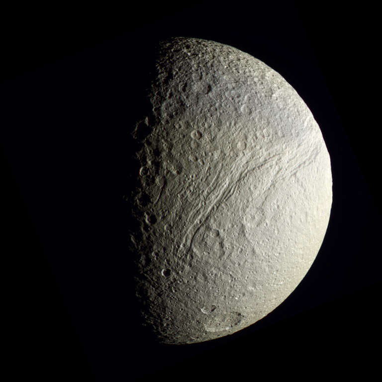 Tethys in enhanced color: south pole and… | The Planetary Society